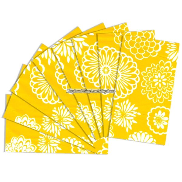 Gult presentpapper med blommor - 8 ark - Zingland.se